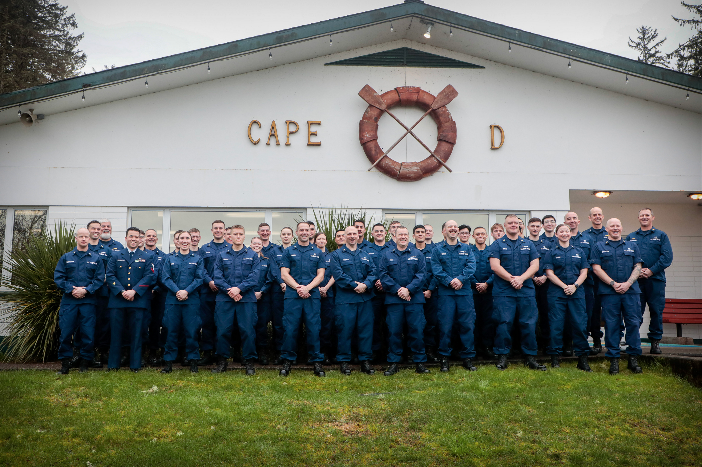 Passing the badge: Coast Guard pins Del Cuadro as newest surfman ...